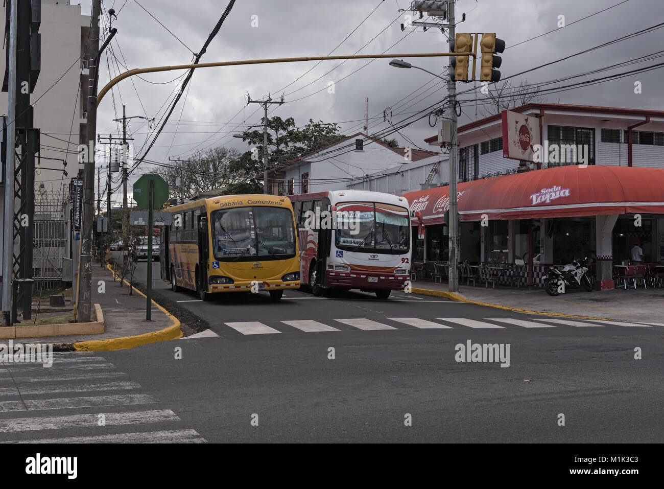 Two buses on a street in San Jose, the capital of Costa Rica Stock ...