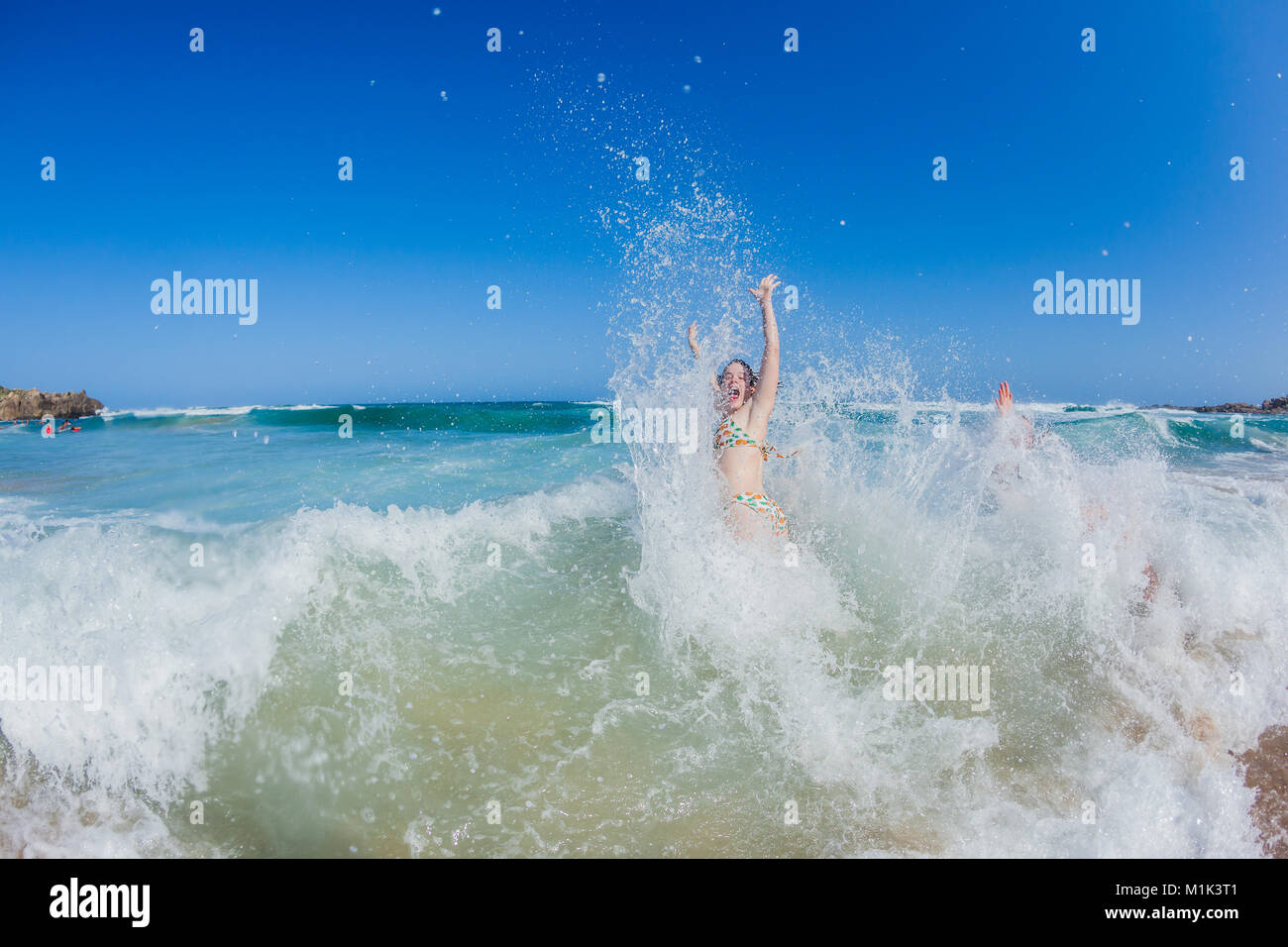 Teenager woman running beach hi-res stock photography and images - Alamy
