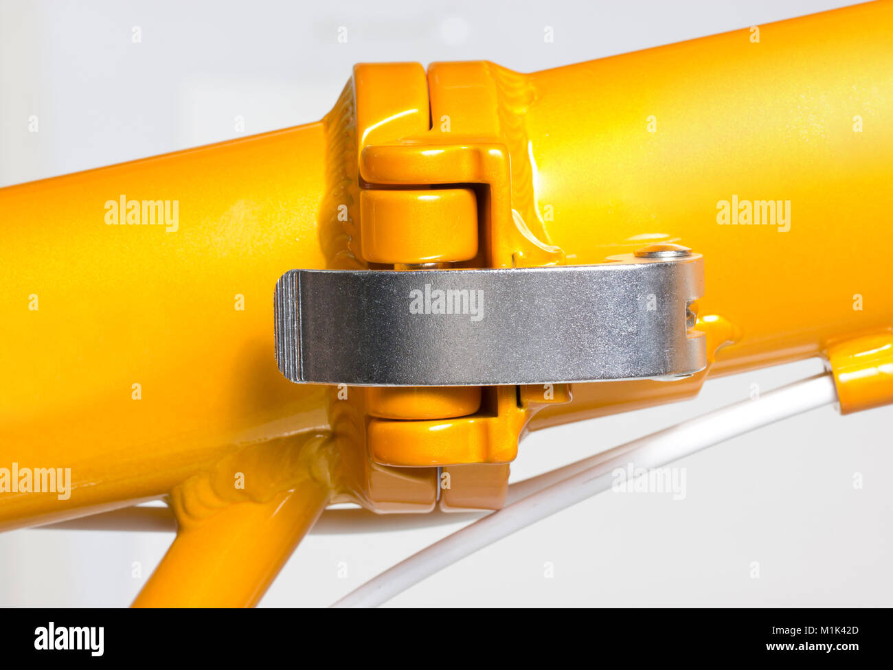 Close up of hinge at middle of frame of folding bicycle Stock Photo - Alamy