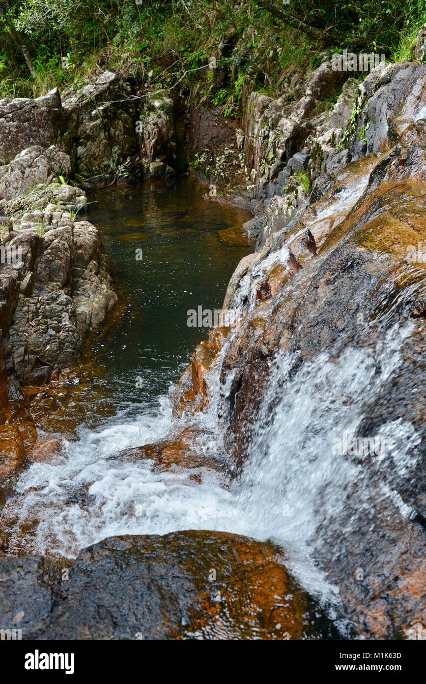 Cloudy creek waterfall and rapids, white water, flowing, rocks, cool ...
