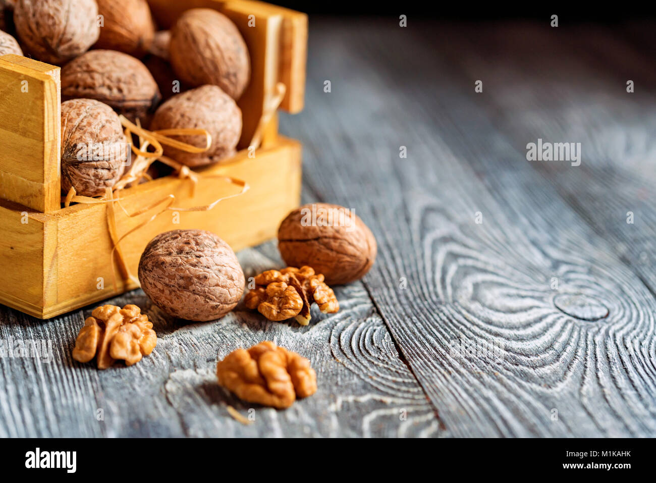 Board tasty walnuts cracker hi-res stock photography and images - Alamy