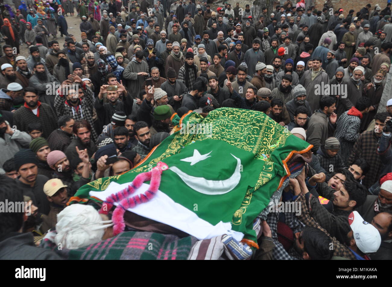 Thousands mourn as the funeral of civilian Rayees Ganie, 19, is ...