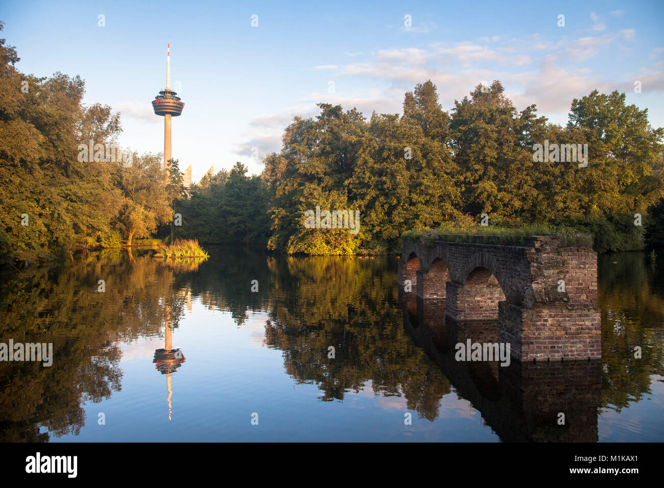 Germany, Cologne, television tower Colonius and pond at the Mediapark ...