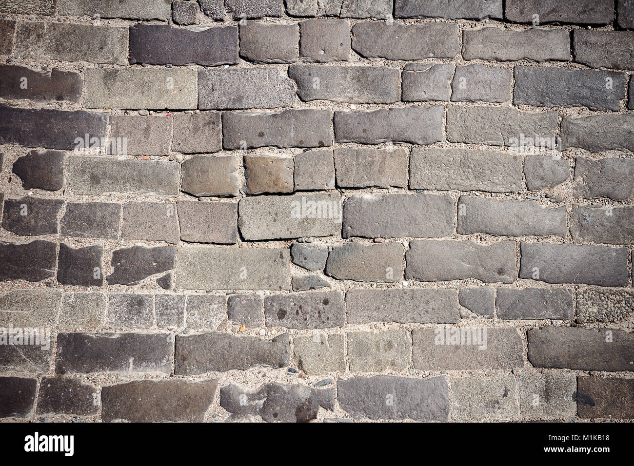 Black and gray stone blocks in the walkway Stock Photo - Alamy