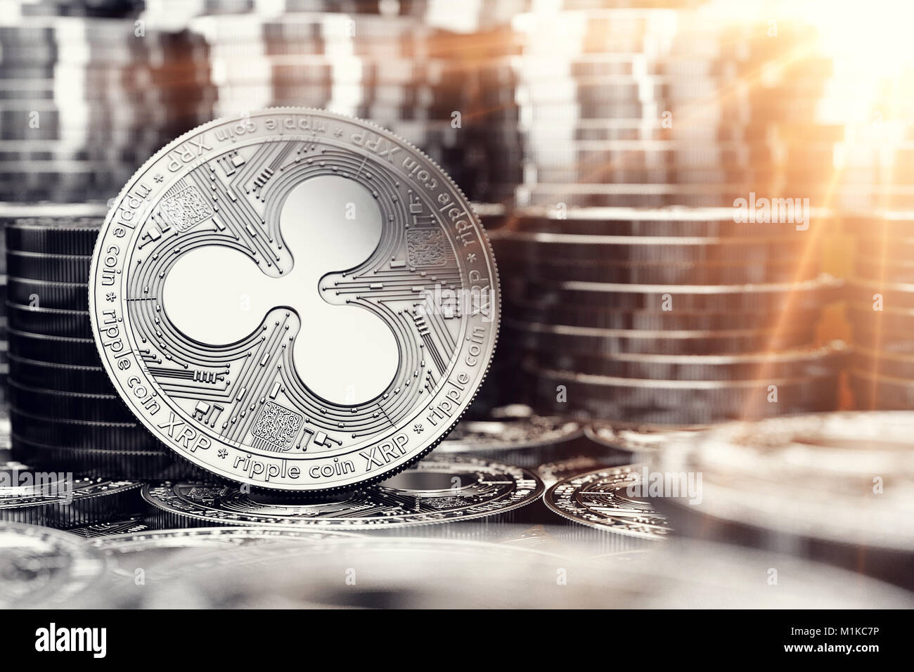 Silver Ripple coin among stack and piles of silver coins and bright sun ...