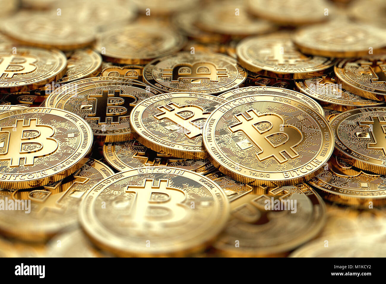 Stack of golden Bitcoin BTC coins in blurry closeup with copy space ...