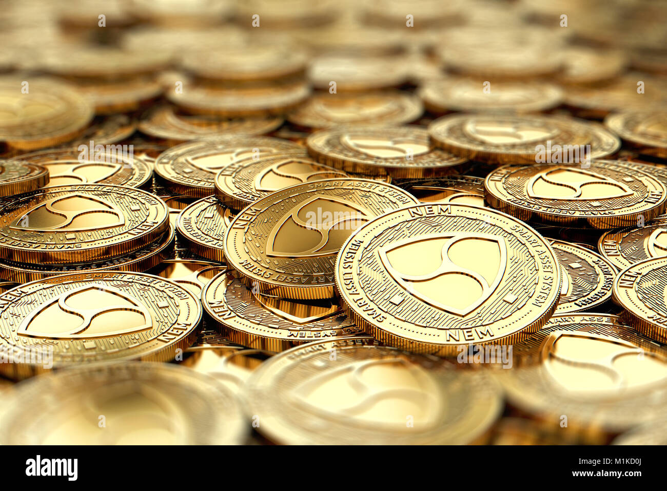 Stack of golden NEM coins in blurry closeup with copy space above in ...