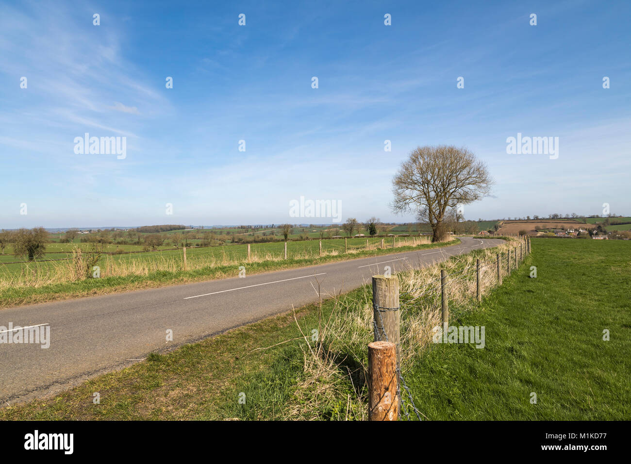 Road passing through the countryside hi-res stock photography and ...
