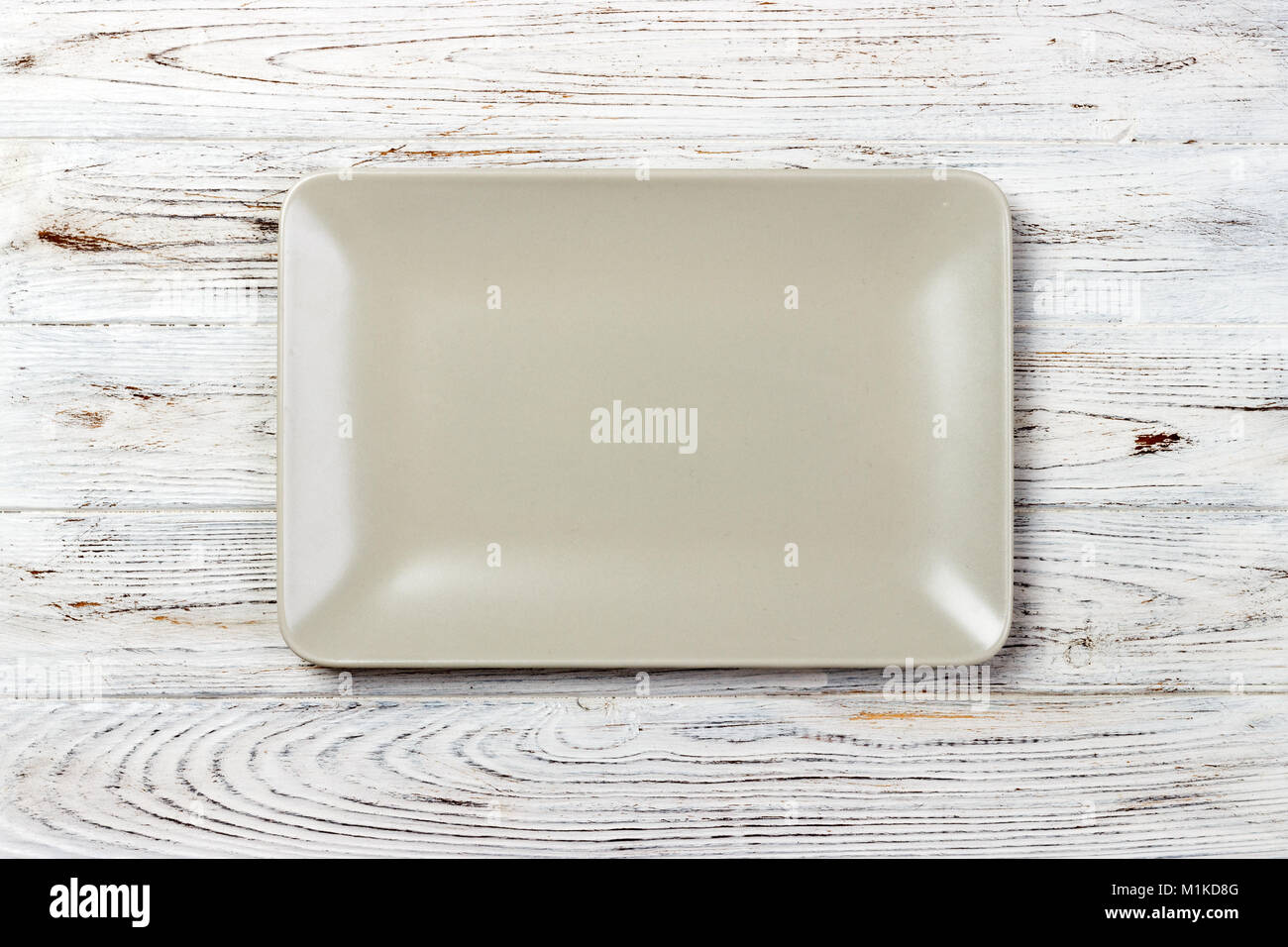 empty rectangular Plate on wooden table background Stock Photo - Alamy