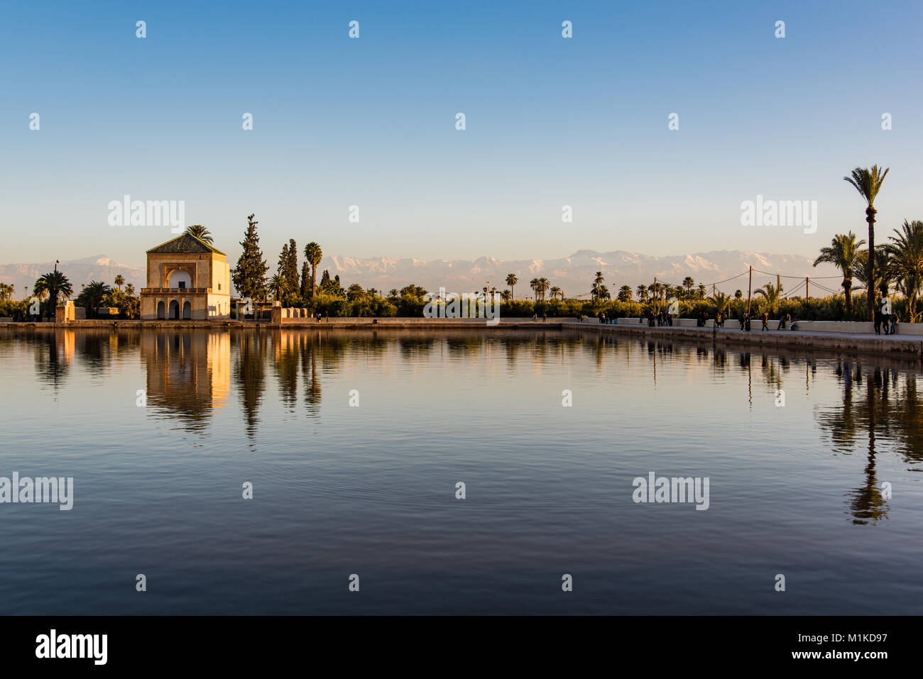 Wide view of Menara Gardens and Atlas mountains in Marrakech,Morocco ...
