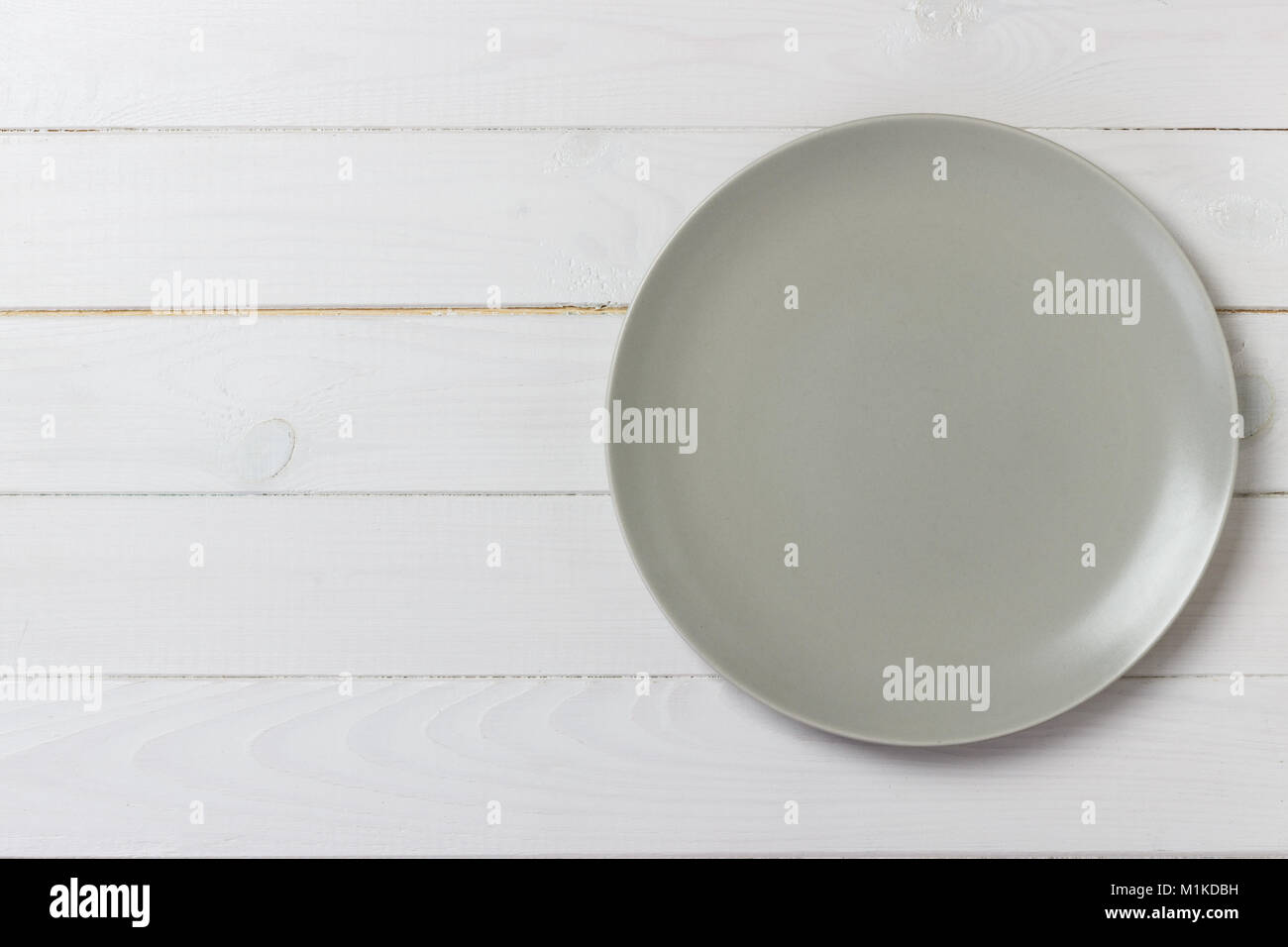 Top view empty matte plate on rustic wooden table. Top view Stock Photo ...