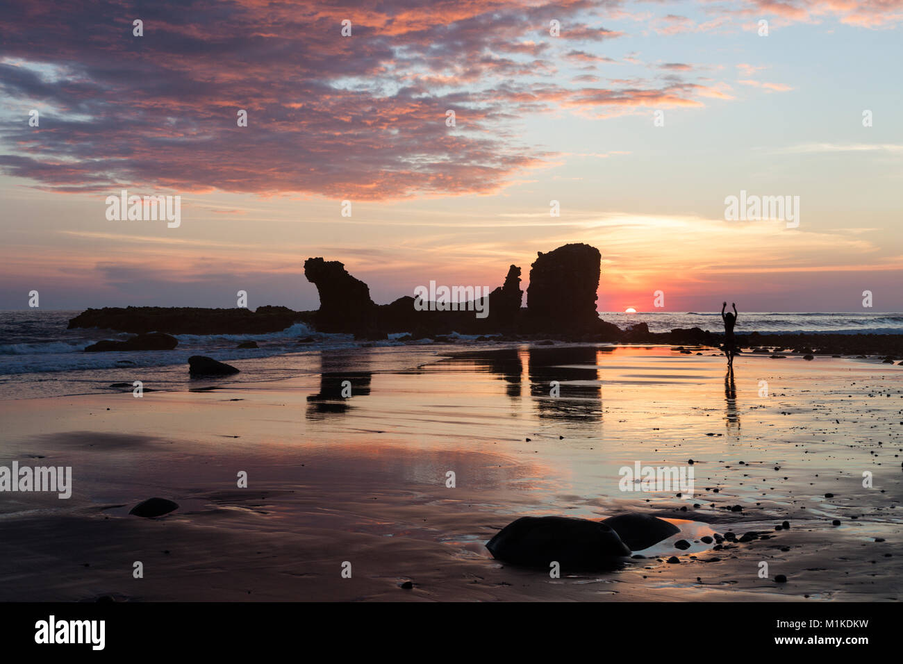 Rocks on El Tunco Beach at sunset. El Tunco, El Salvador Stock Photo ...