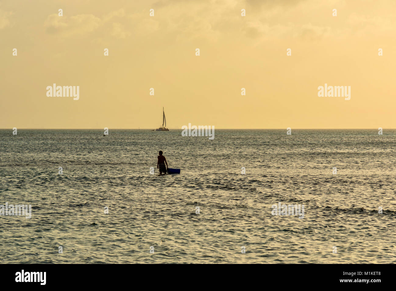 Scenic view of a sunset in the idyllic island of Aruba. Caribbean ...
