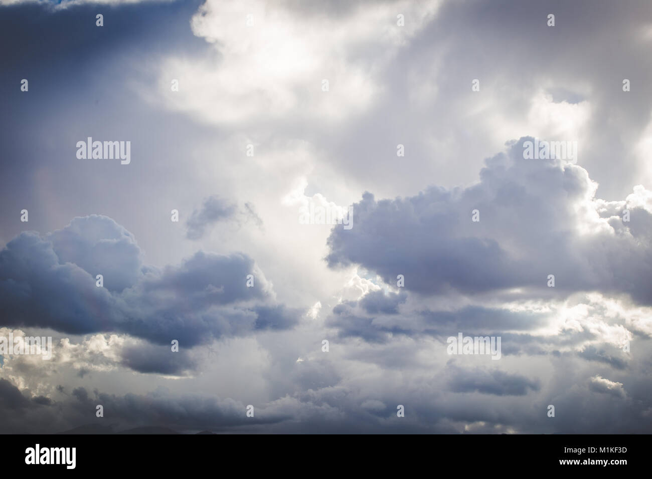 Cloudscape of thunderclouds in the summer sky on a hot and humid day ...