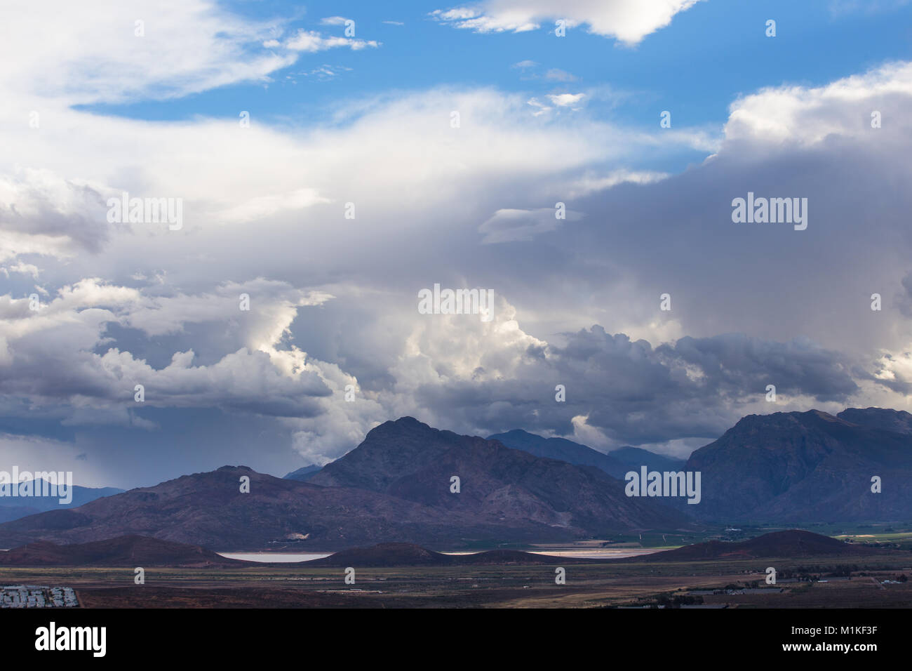 Field landscape with road and approaching thunderstorm in summer hi-res ...