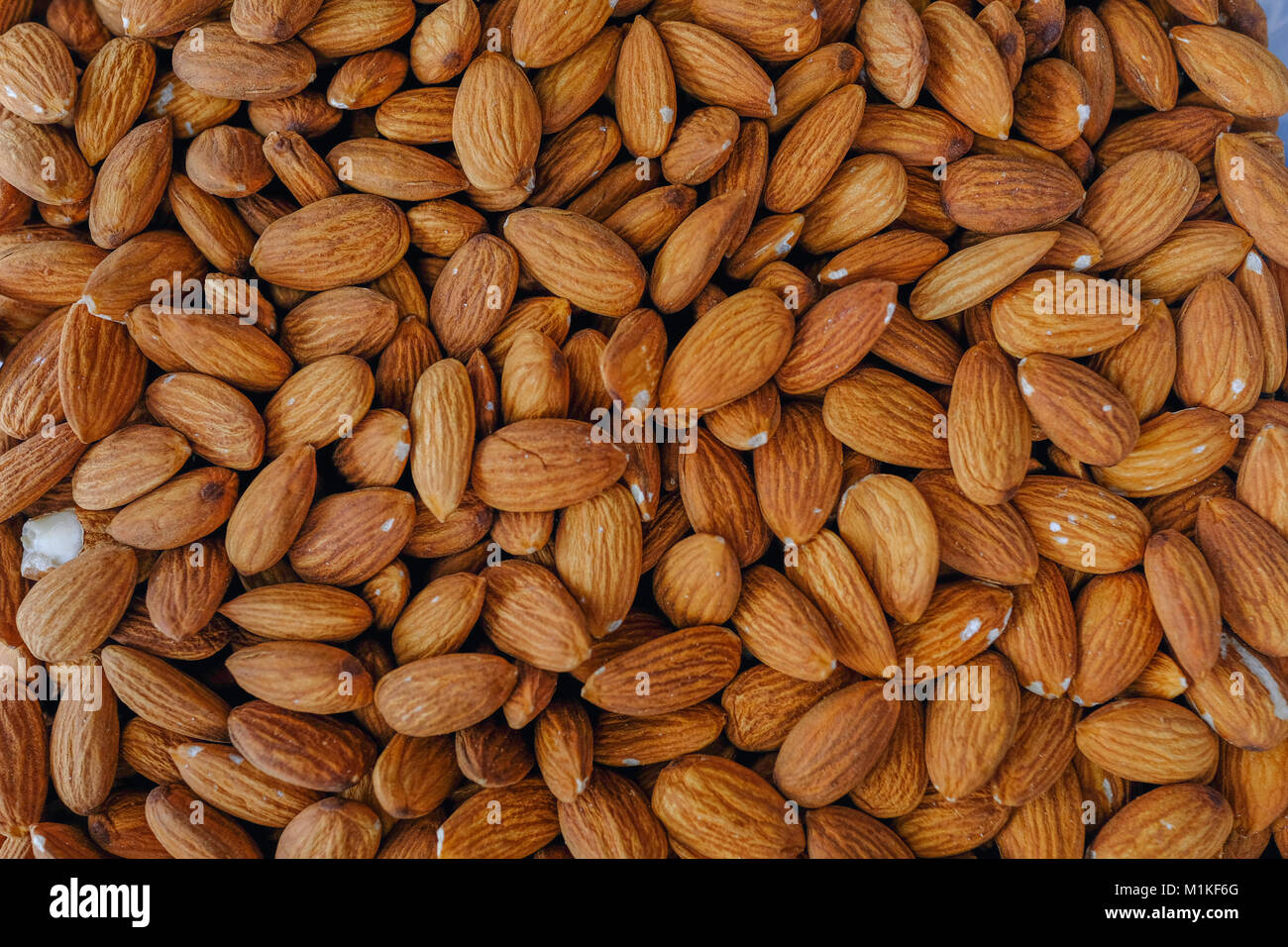 Lots of loose almonds without their shells. Natural and organic Stock ...