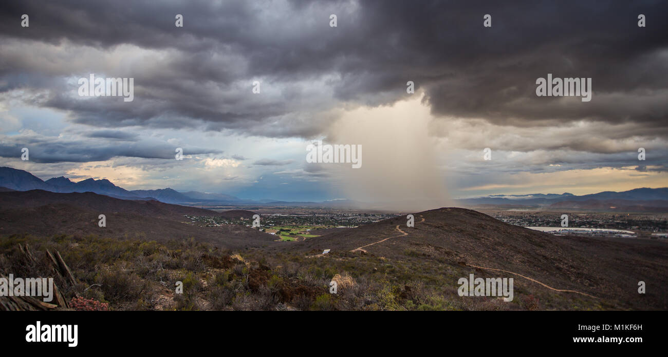 Field landscape with road and approaching thunderstorm in summer hi-res ...