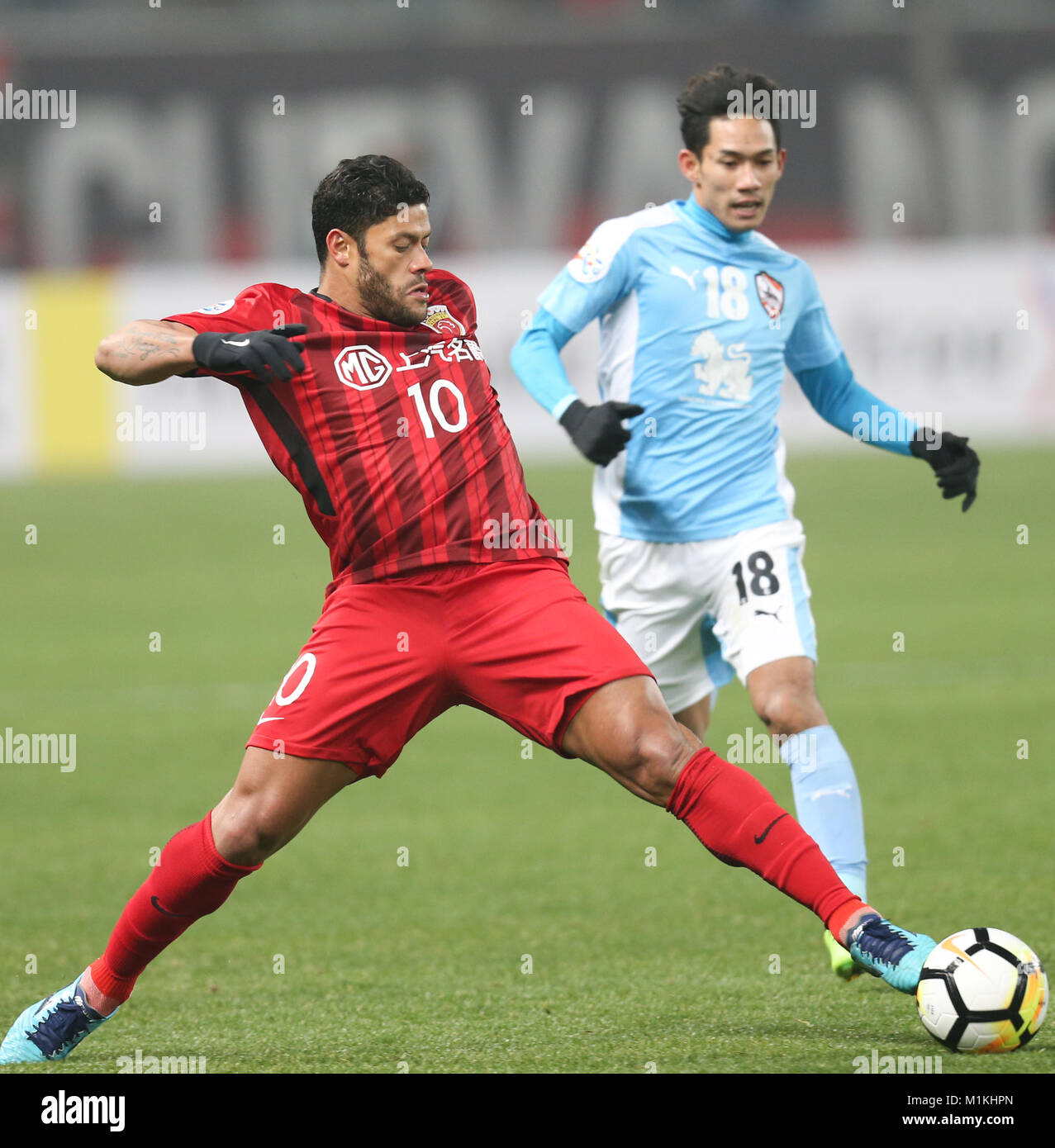 Shanghai, China. 30th Jan, 2018. Hulk (L) of China's Shanghai SIPG FC ...