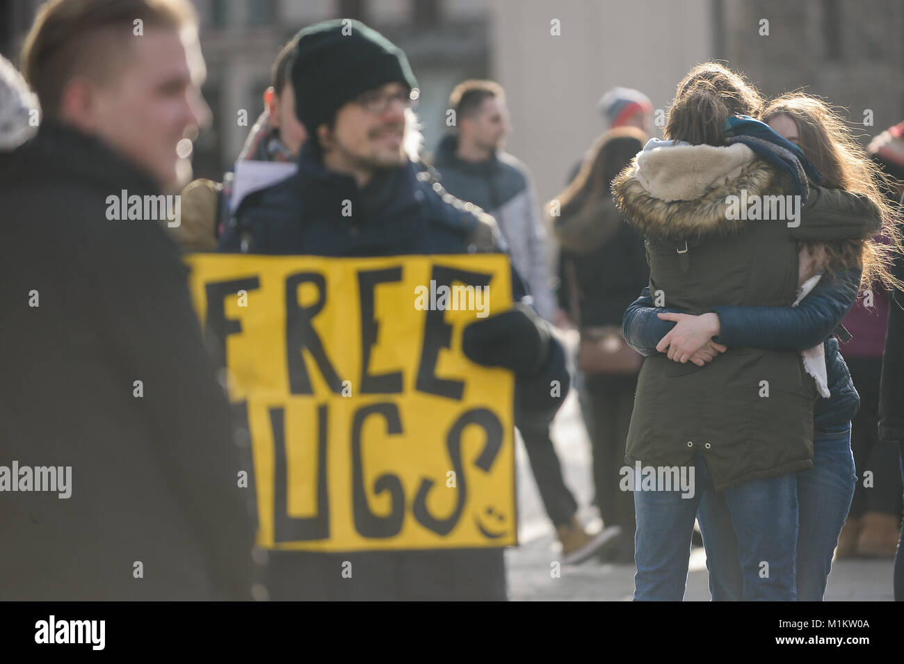 Krakow, Poland. 31st Jan, 2018. Random people hug each others during a ...