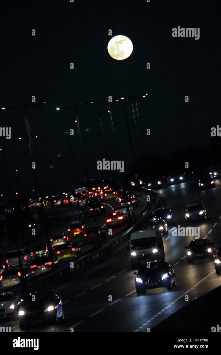 Hanworth London UK. 31st January 2018. The super blue moon seen low in ...