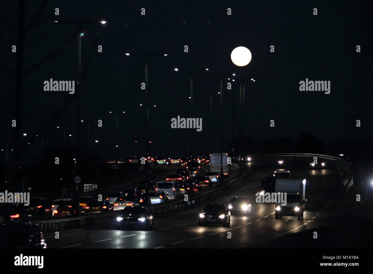 Hanworth London UK. 31st January 2018. The super blue moon seen low in ...