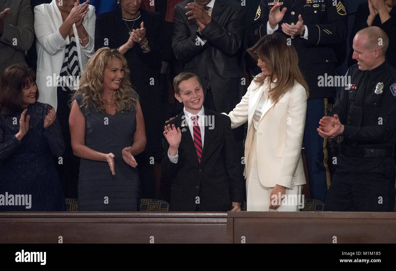 His Left. 30th Jan, 2018. Preston Sharp, center, waves from the first ...