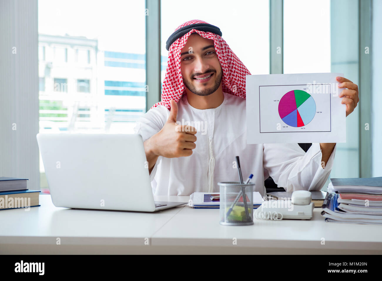 Arab businessman working in the office Stock Photo - Alamy