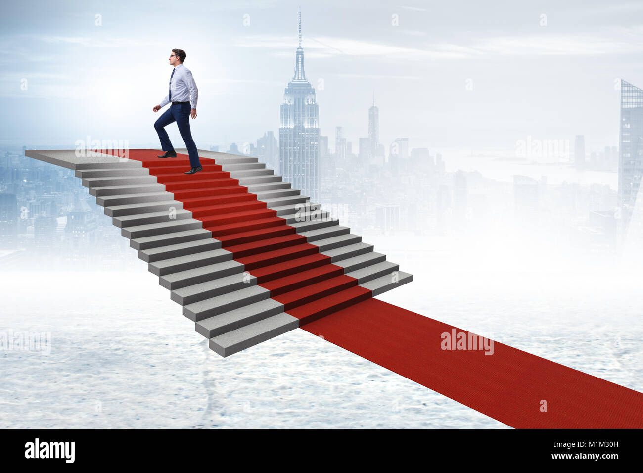 Young businessman climbing stairs and red carpet Stock Photo - Alamy