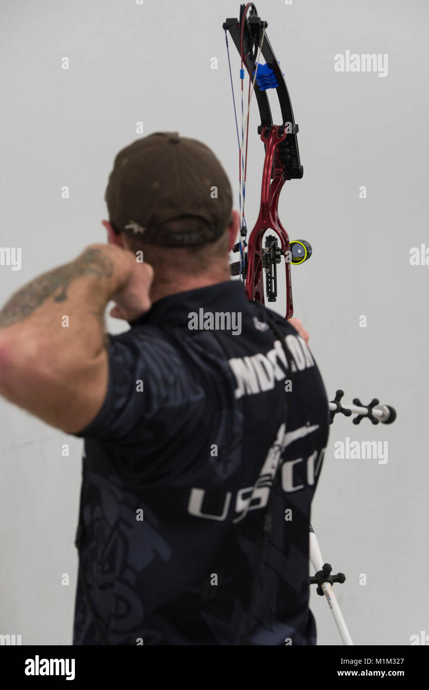 U.S. Army Sgt. 1st Class Josh Lindstrom is at full draw during practice ...
