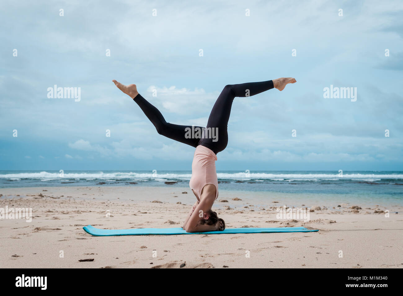 Woman Headstand Beach High Resolution Stock Photography and Images - Alamy