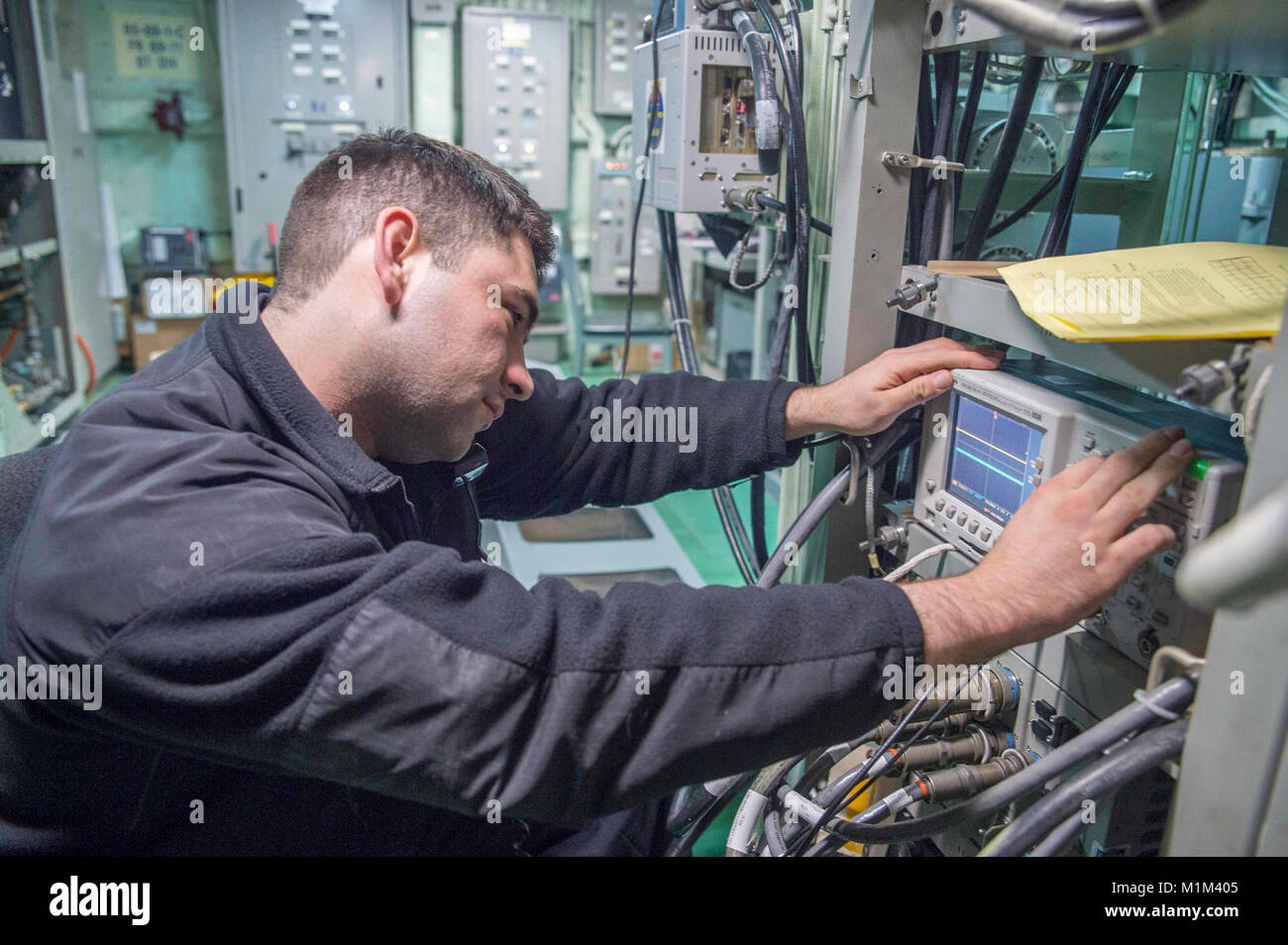 PHILIPPINE SEA (Jan. 27, 2018) Petty Officer 2nd Class George Guzman ...