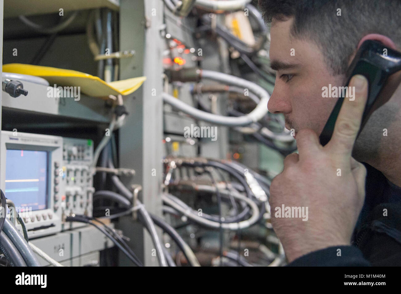 PHILIPPINE SEA (Jan. 27, 2018) Petty Officer 2nd Class George Guzman ...