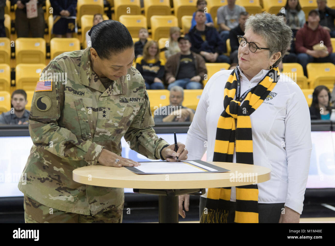Maj. Gen. Linda Singh, the adjutant general of Maryland, and Kim ...