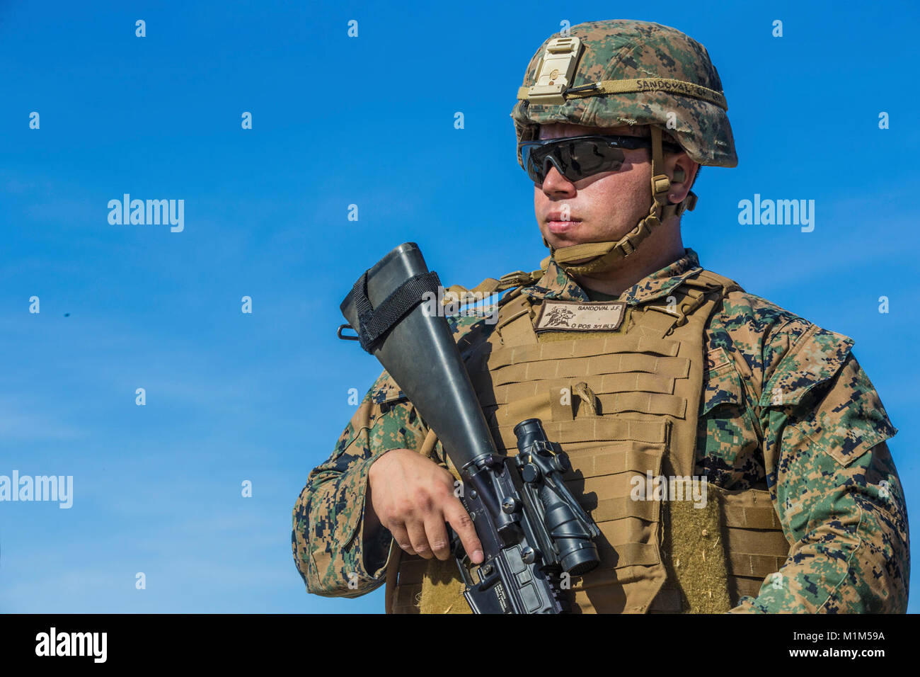U.S. Marine Corps Cpl. Jesus Sandoval, an optics technician with Combat ...