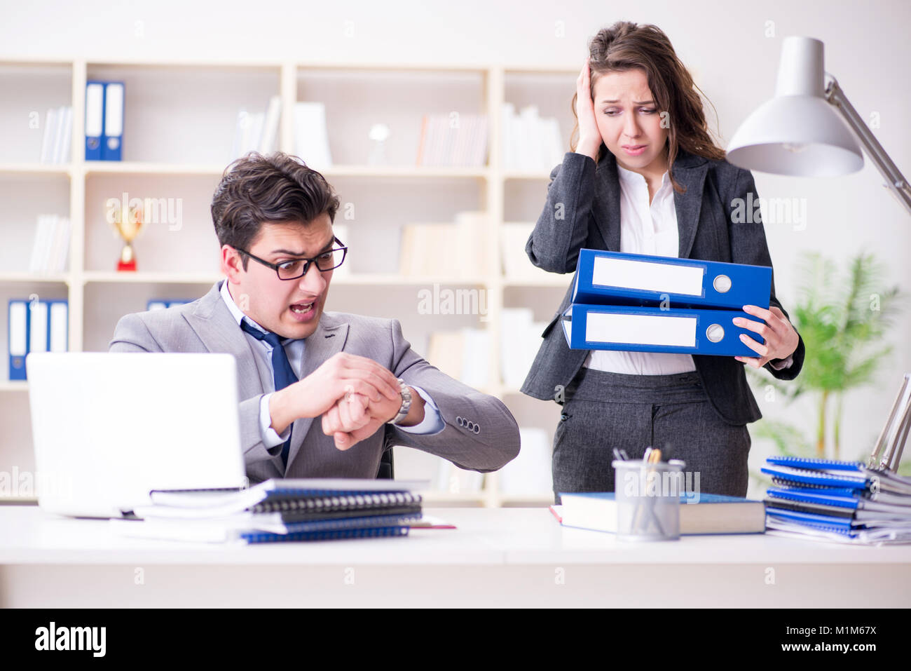 Angry boss unhappy with female employee performance Stock Photo - Alamy