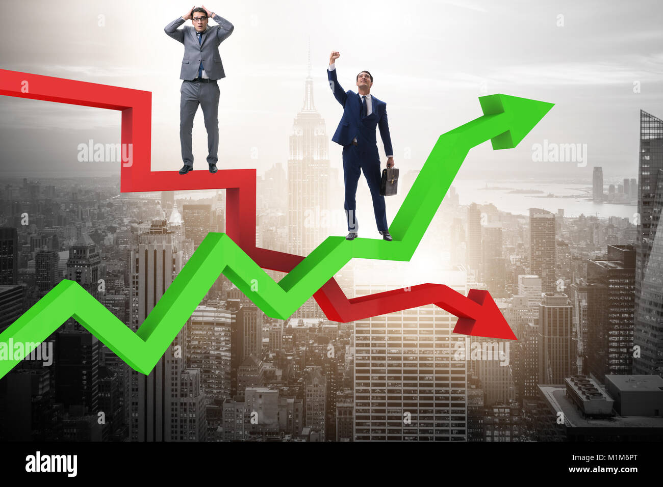 Businessman with charts of growth and decline Stock Photo - Alamy