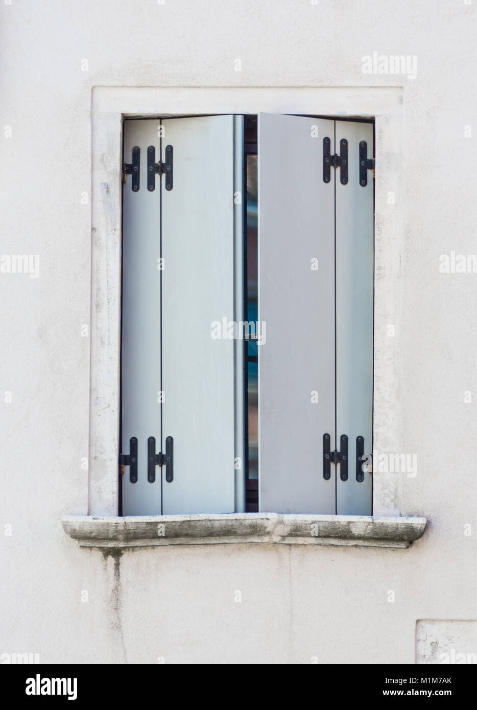 exterior of an old building with windows Stock Photo - Alamy