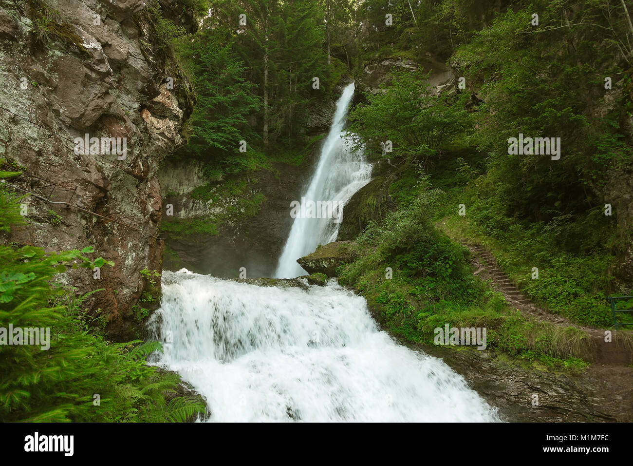 nature landscape, waterfall in the Italian Alps Stock Photo - Alamy