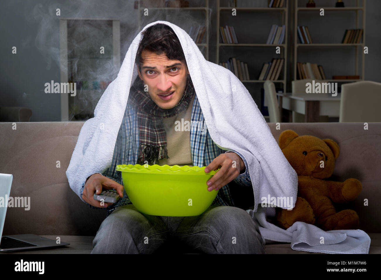 Sick man doing inhalation at night in home Stock Photo - Alamy