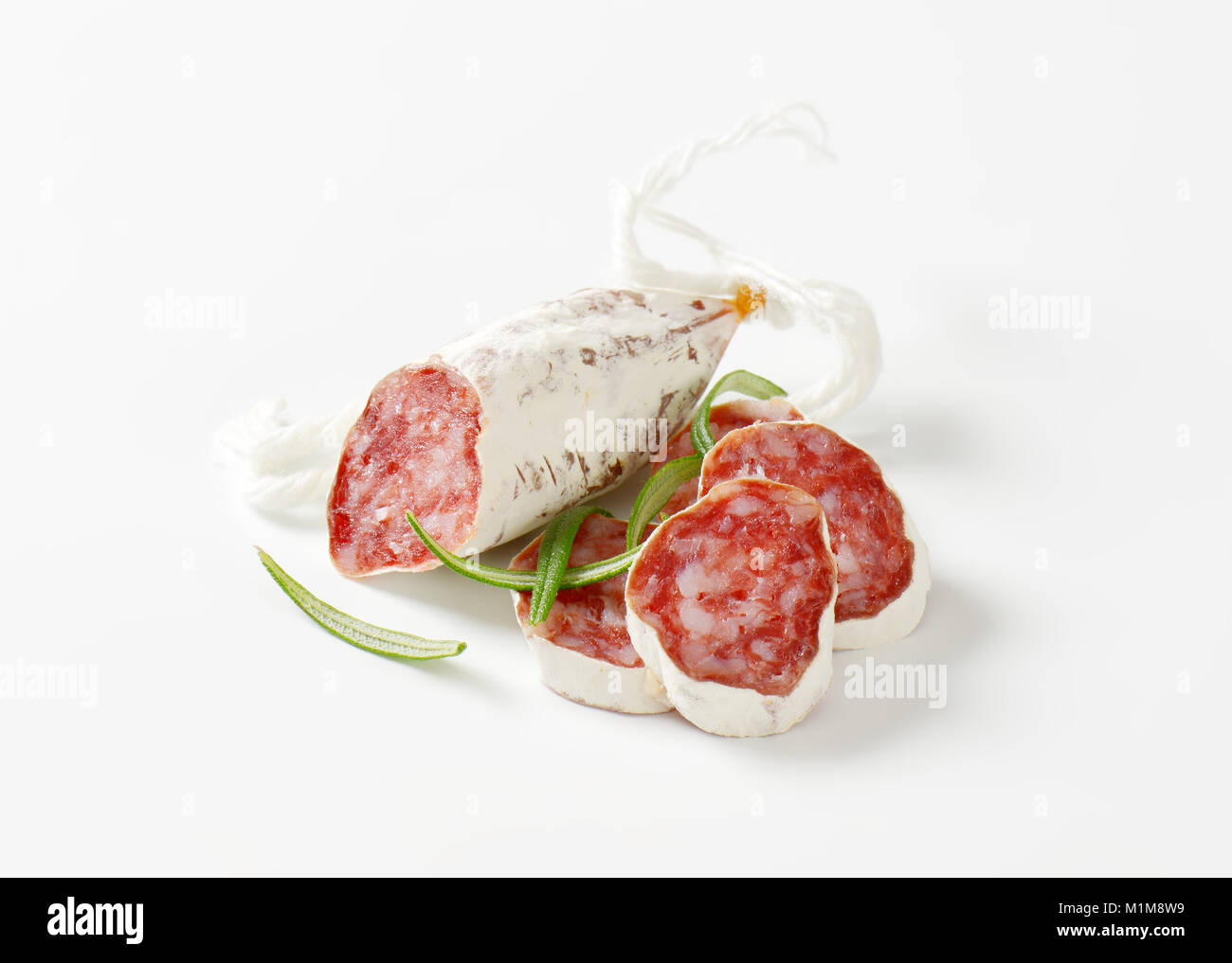 Slices of Spanish thin dried sausage Stock Photo - Alamy