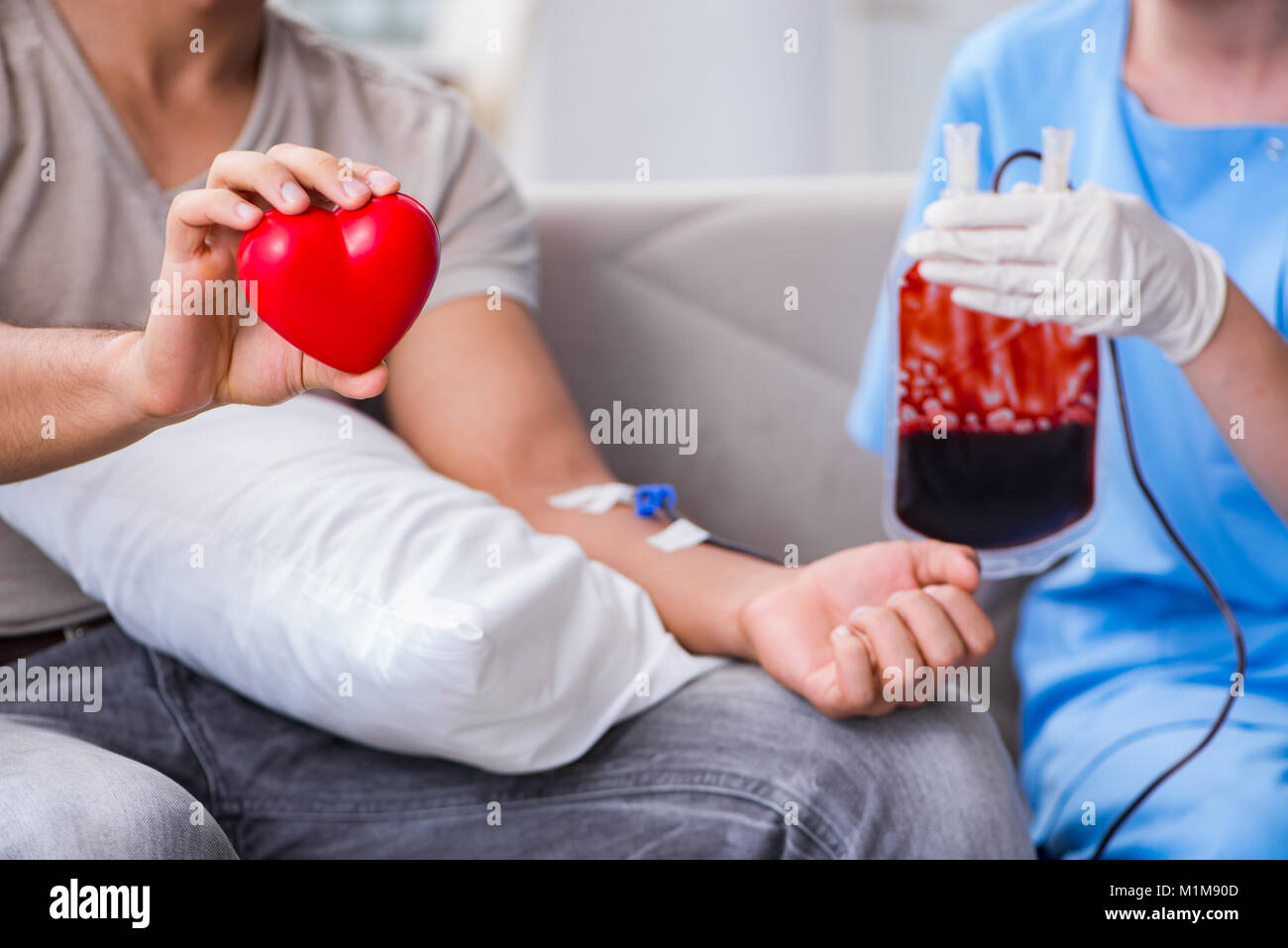 Patient getting blood transfusion in hospital clinic Stock Photo - Alamy