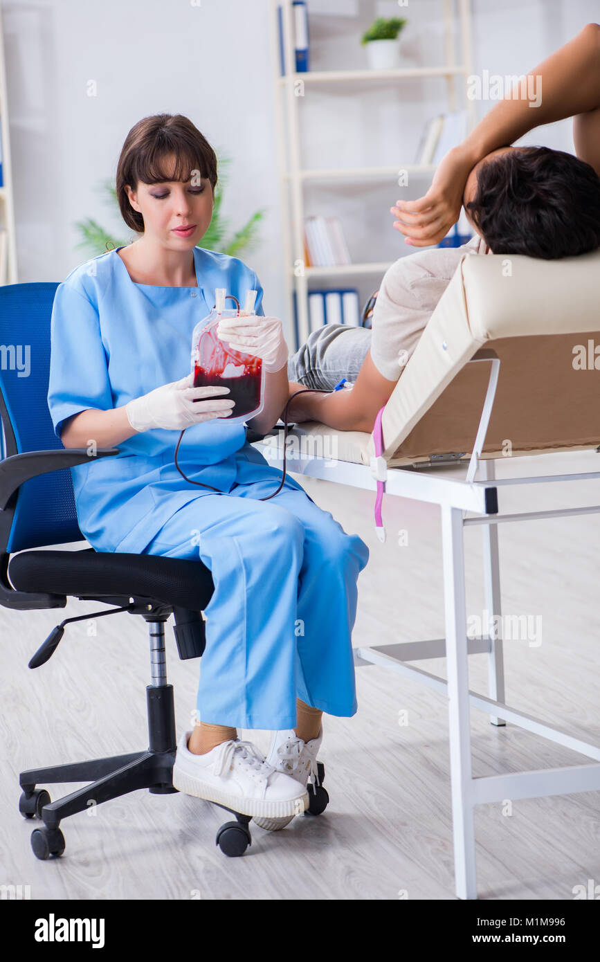 Patient getting blood transfusion in hospital clinic Stock Photo - Alamy