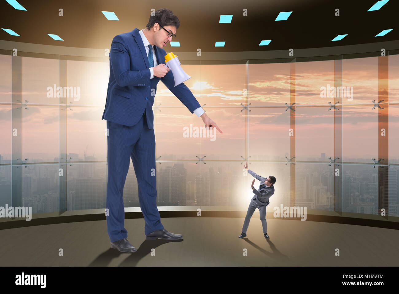 Bad angry boss shouting at employee with loudspeaker Stock Photo - Alamy