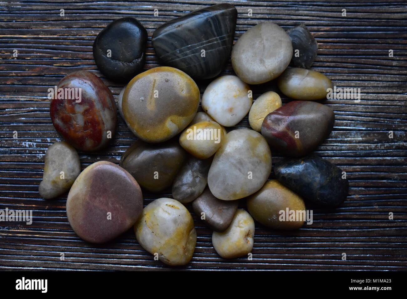 Shiny pebbles hi-res stock photography and images - Alamy