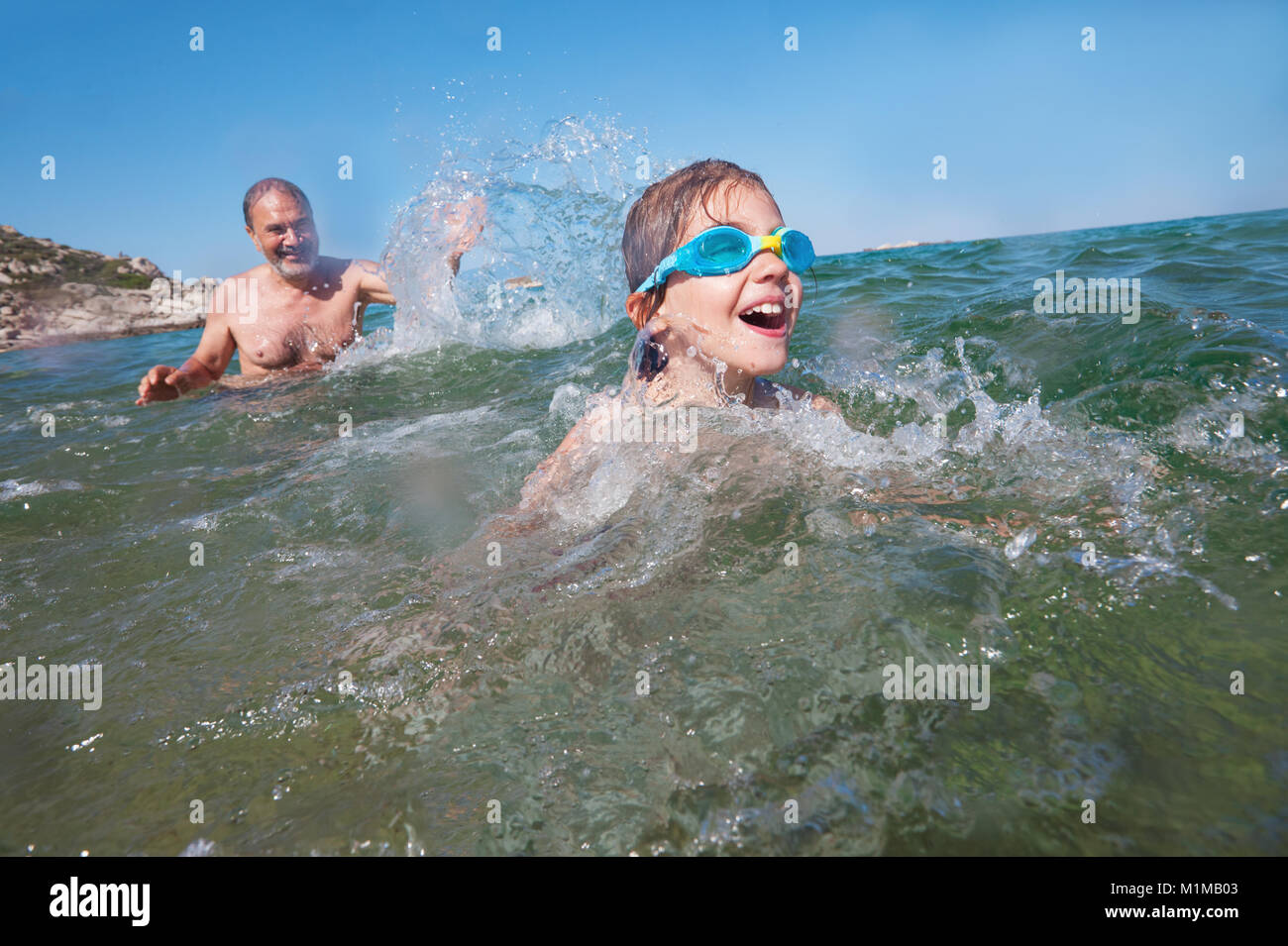 Grandfather Kid Sea Fun Stock Photo - Alamy