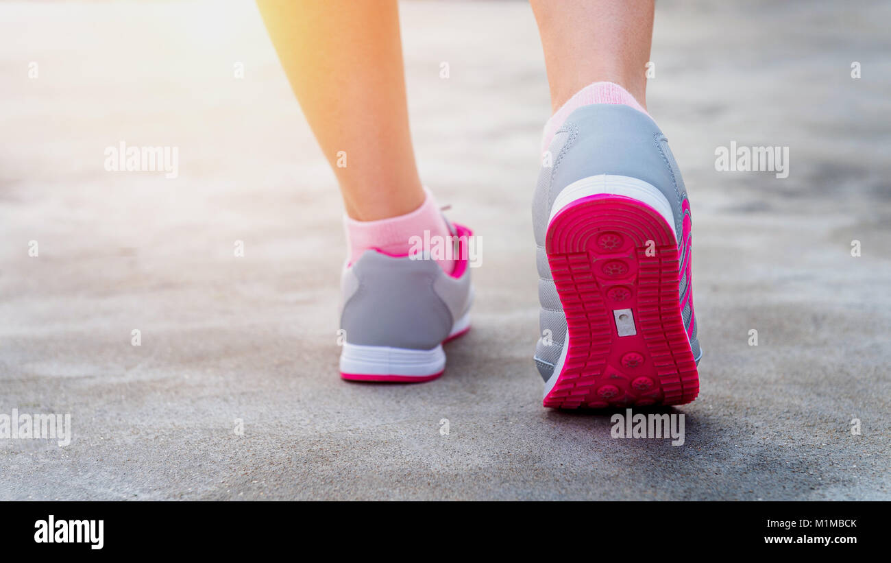 Woman jogging low angle hi-res stock photography and images - Alamy