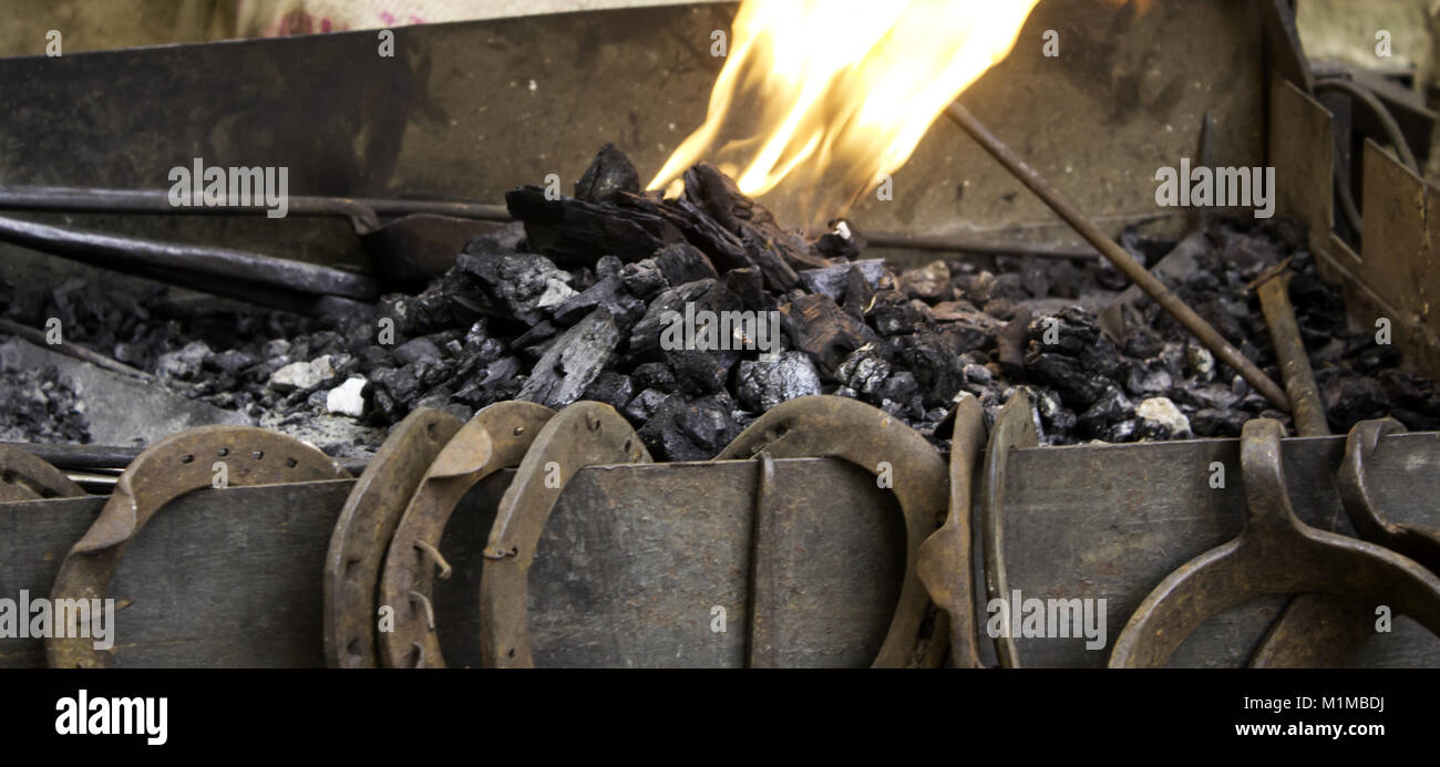 Fire in medieval forge stall, ancient industry Stock Photo - Alamy