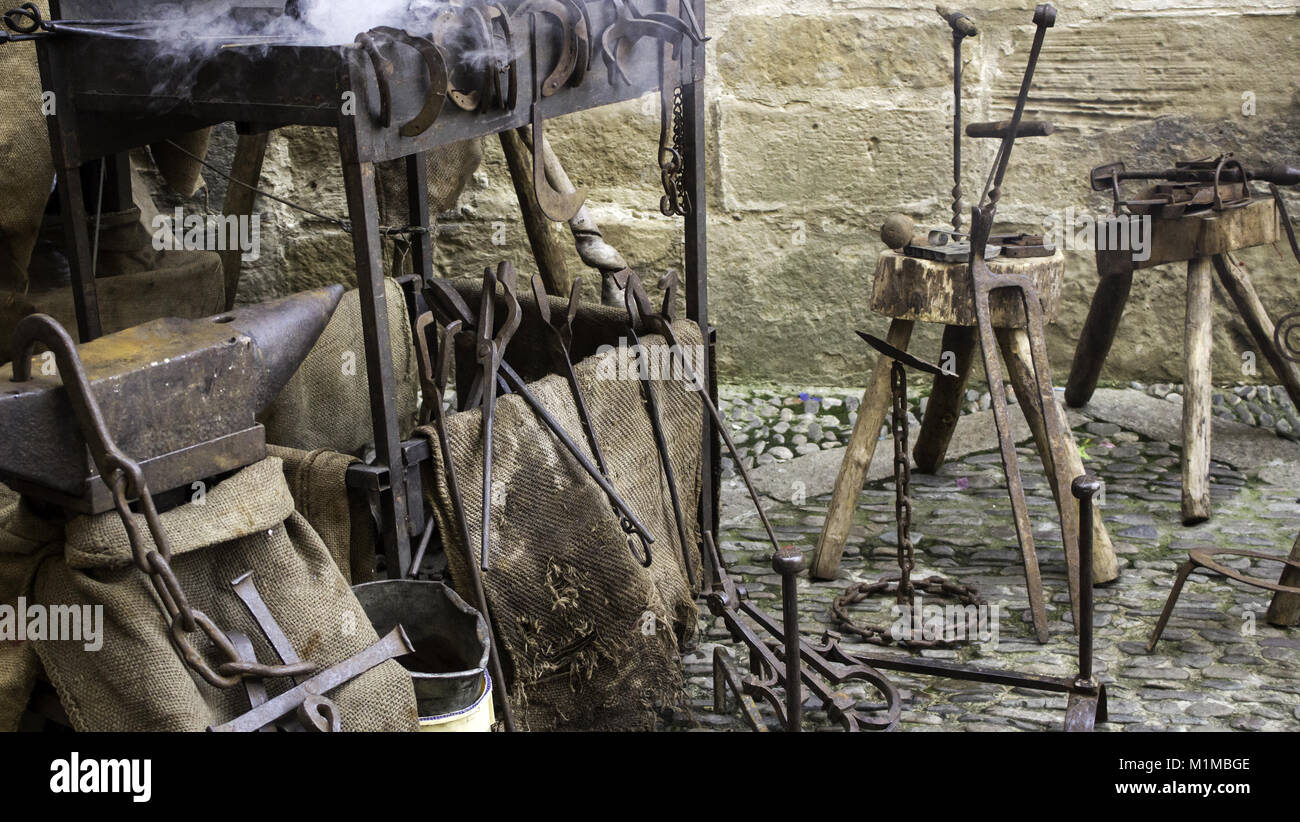 Fire in medieval forge stall, ancient industry Stock Photo - Alamy