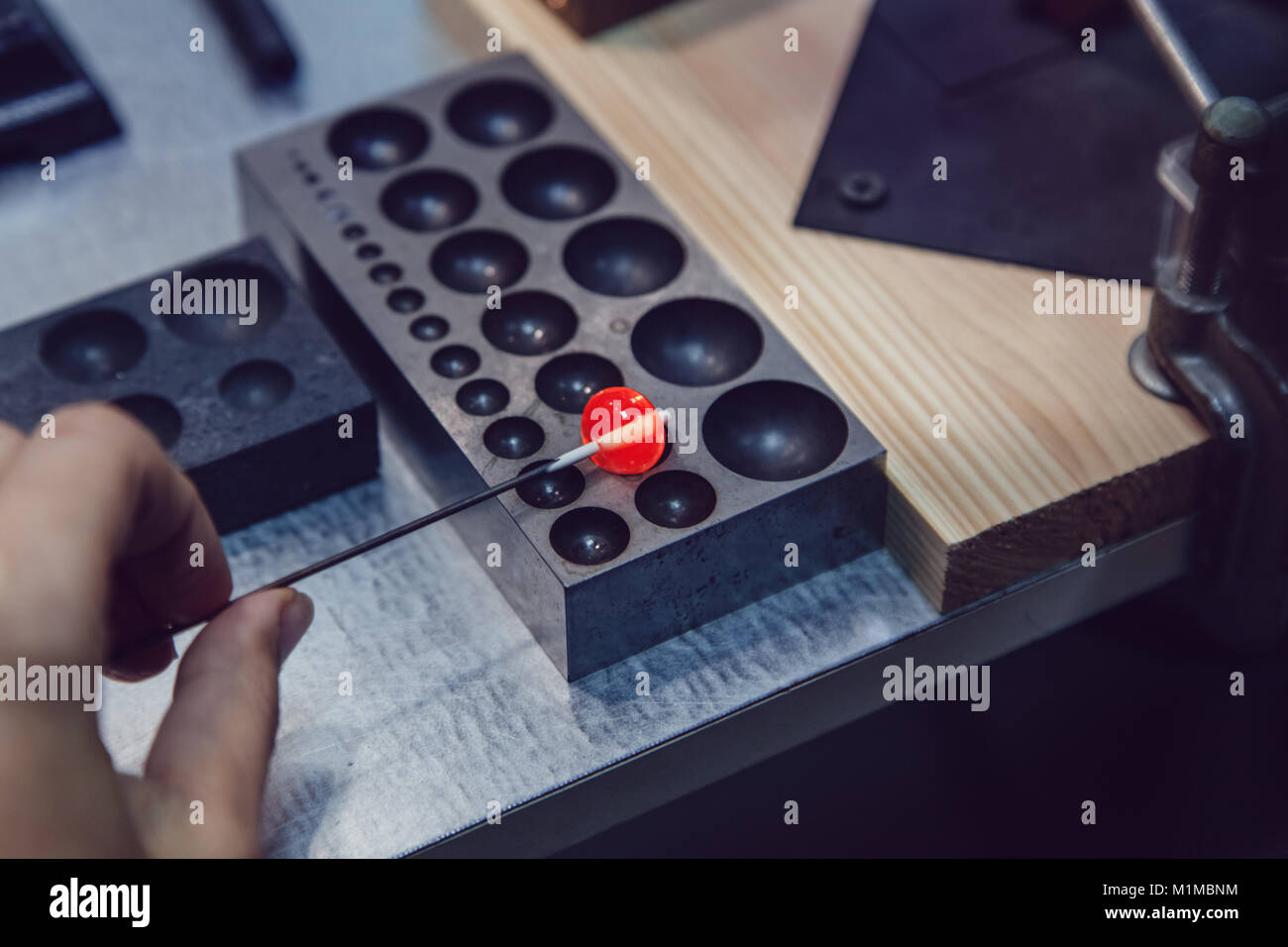 Process of manufacturing costume jewelery from Venetian glass Stock ...