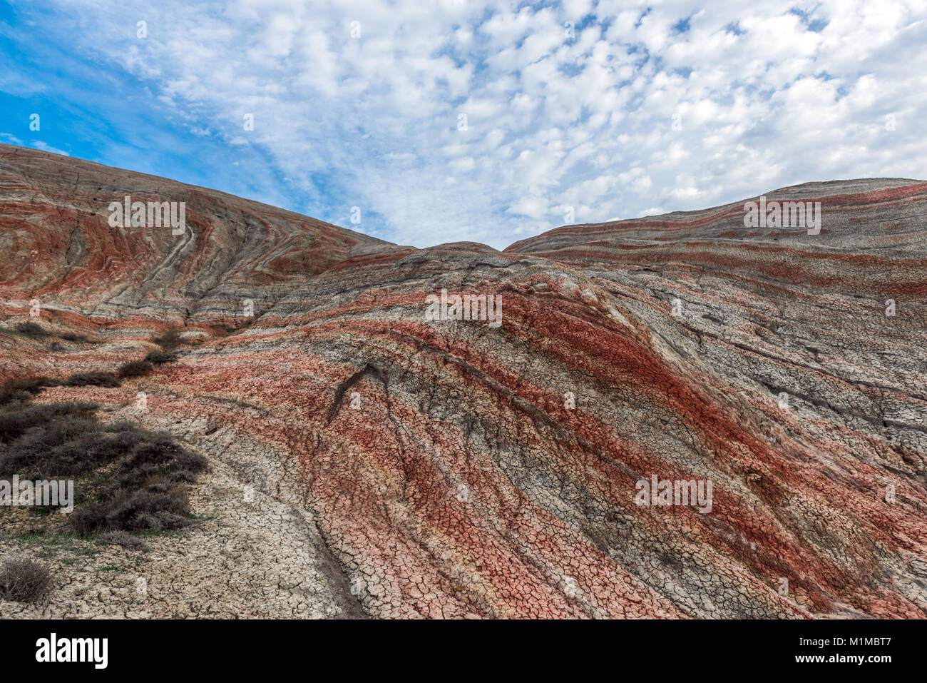 Amazing striped red mountains Stock Photo - Alamy